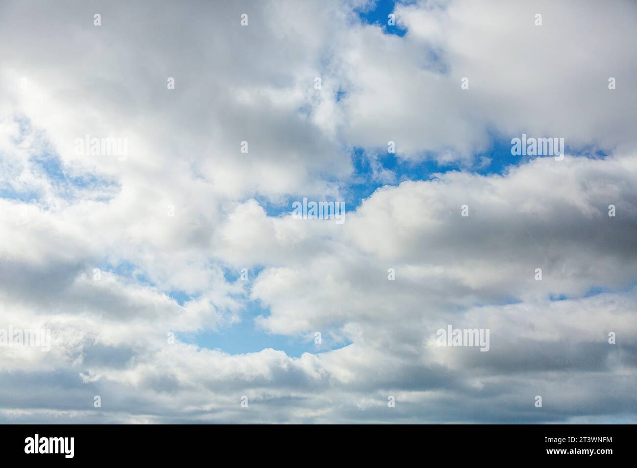 Image of a partly cloudy and partly clear sky during the day without ...