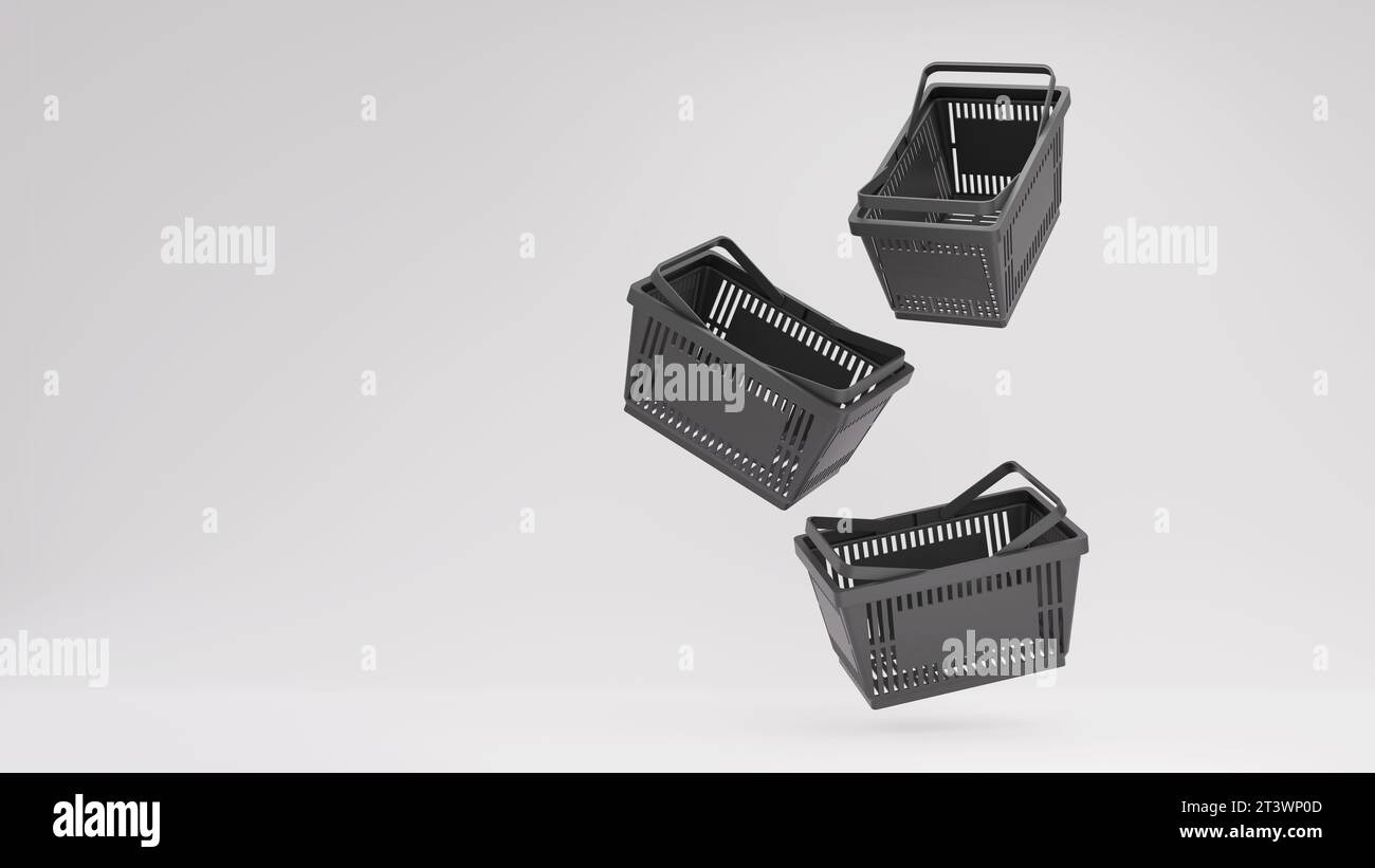 Three plastic black shopping baskets on the grey background. Suspended ...