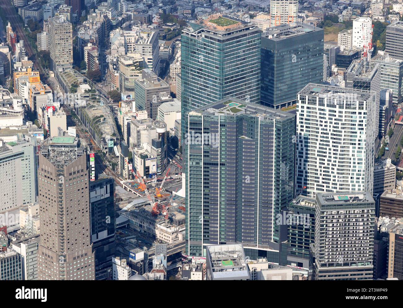 An aerial photo shows high-rise buildings being constructed in Shibuya ...