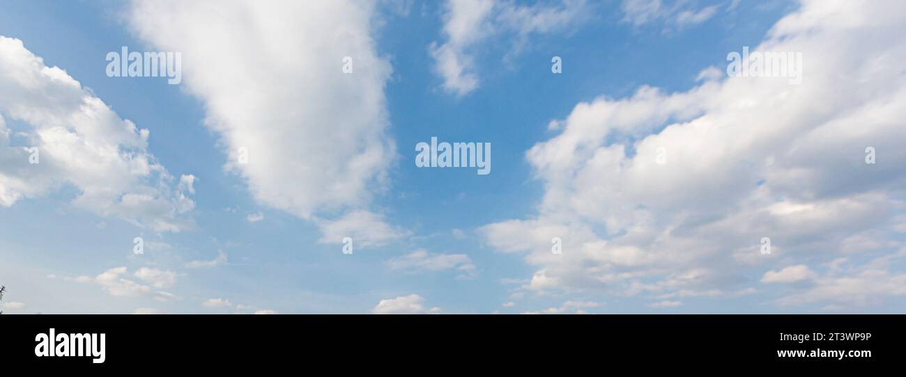 Image of a partly cloudy and partly clear sky during the day without ...