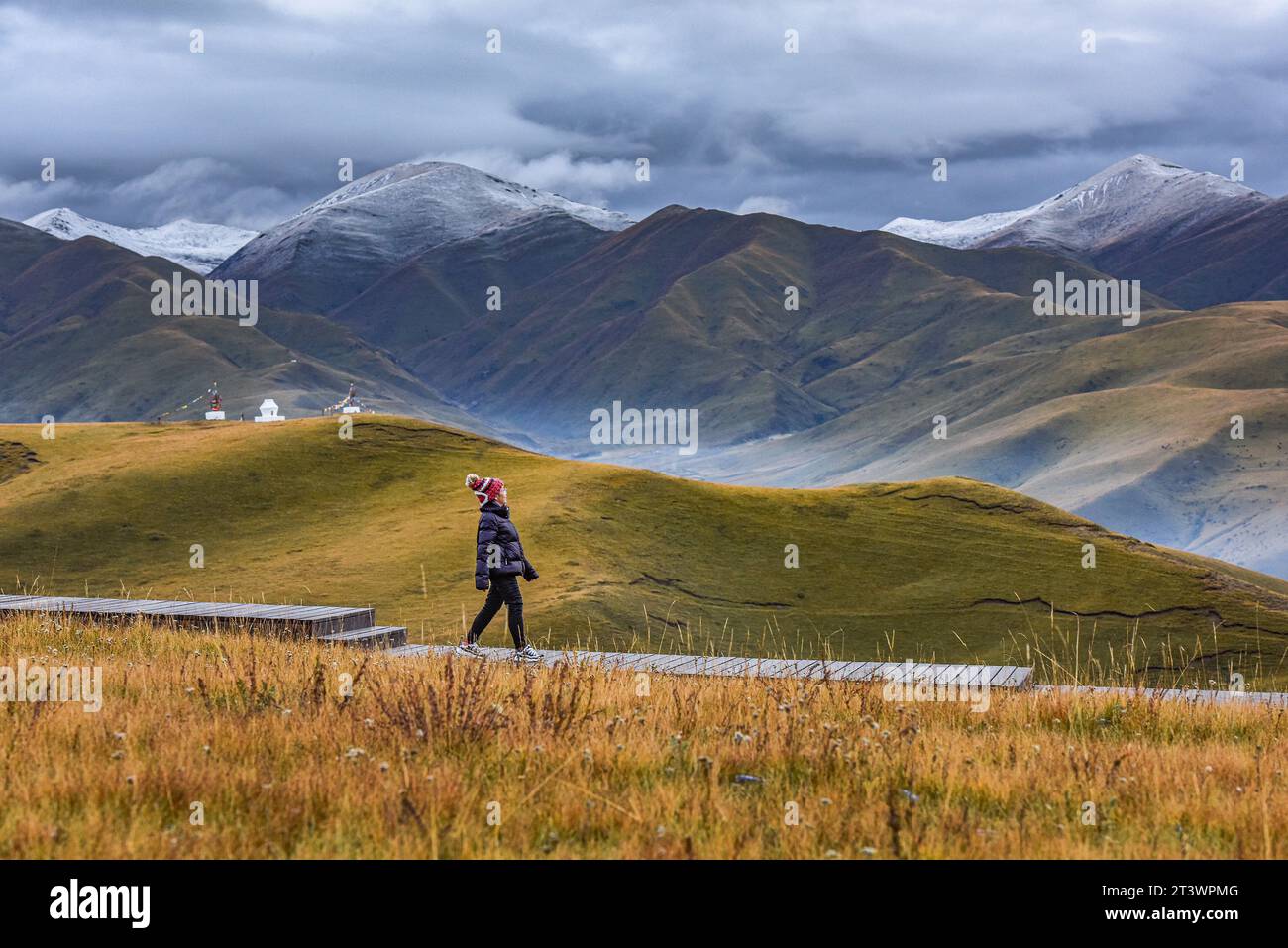 ABA, CHINA - OCTOBER 11, 2023 - A tourist looks at the Langyi Temple ...