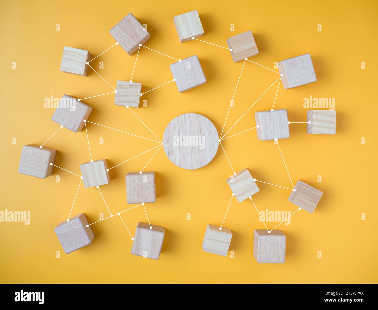 Connected wooden blocks on a yellow background It represents the ...