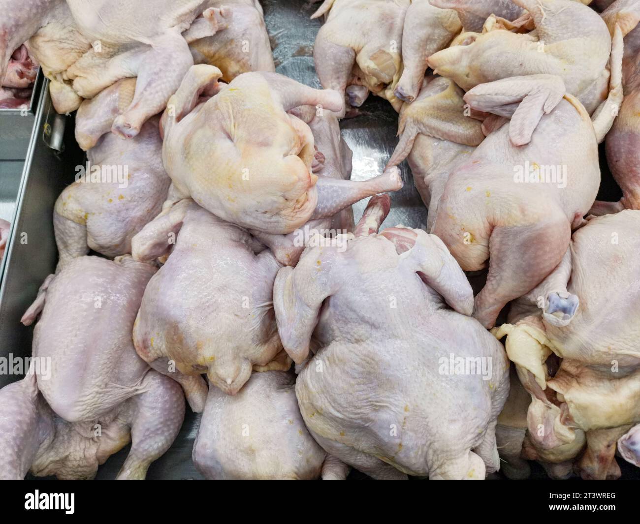 Whole raw chickens for sale Stock Photo - Alamy
