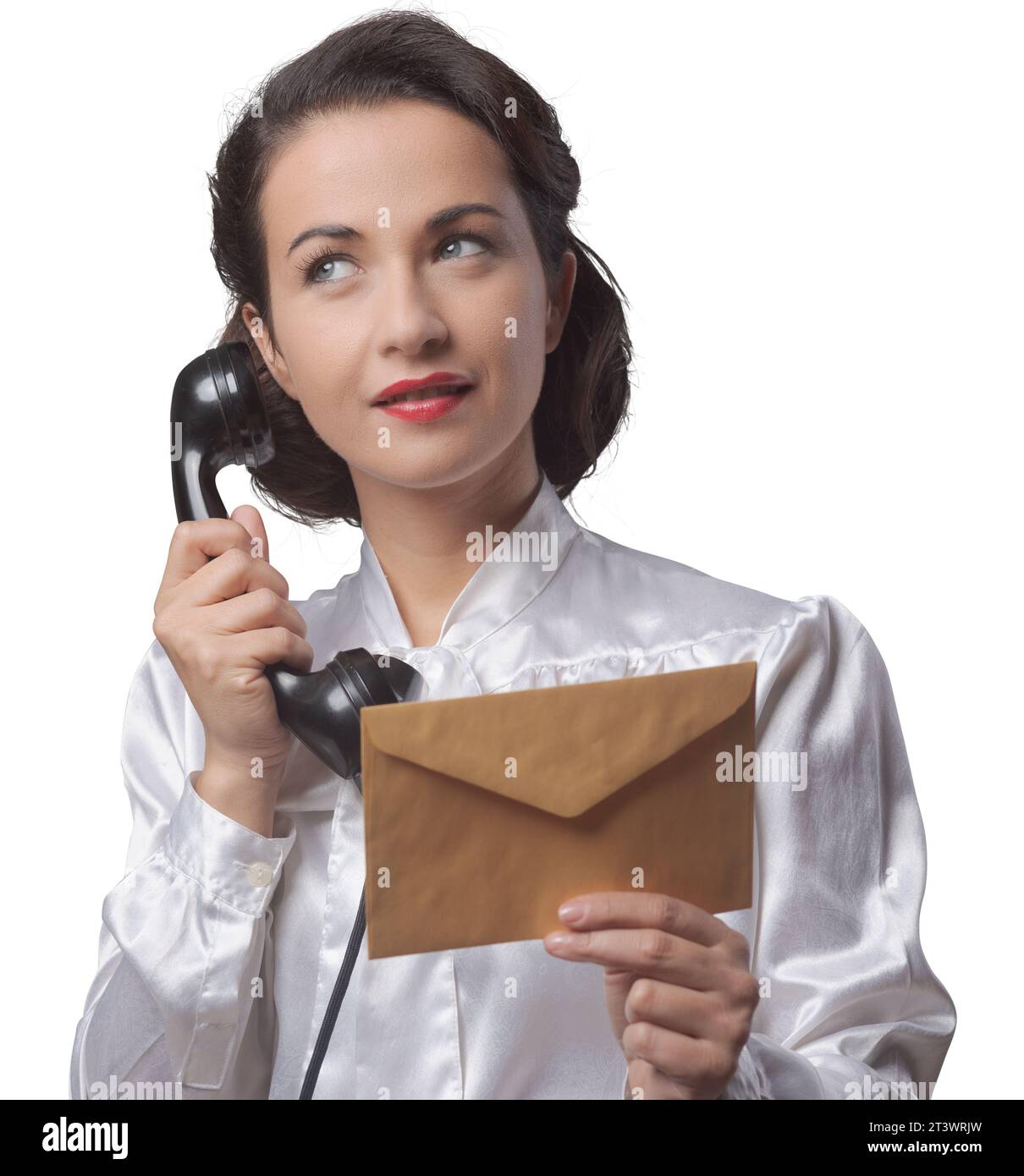 Vintage secretary on the phone holding a closed envelope Stock Photo ...