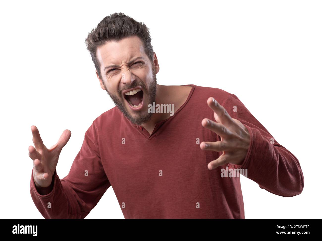 Angry aggressive man shouting out loud with ferocious expression on ...