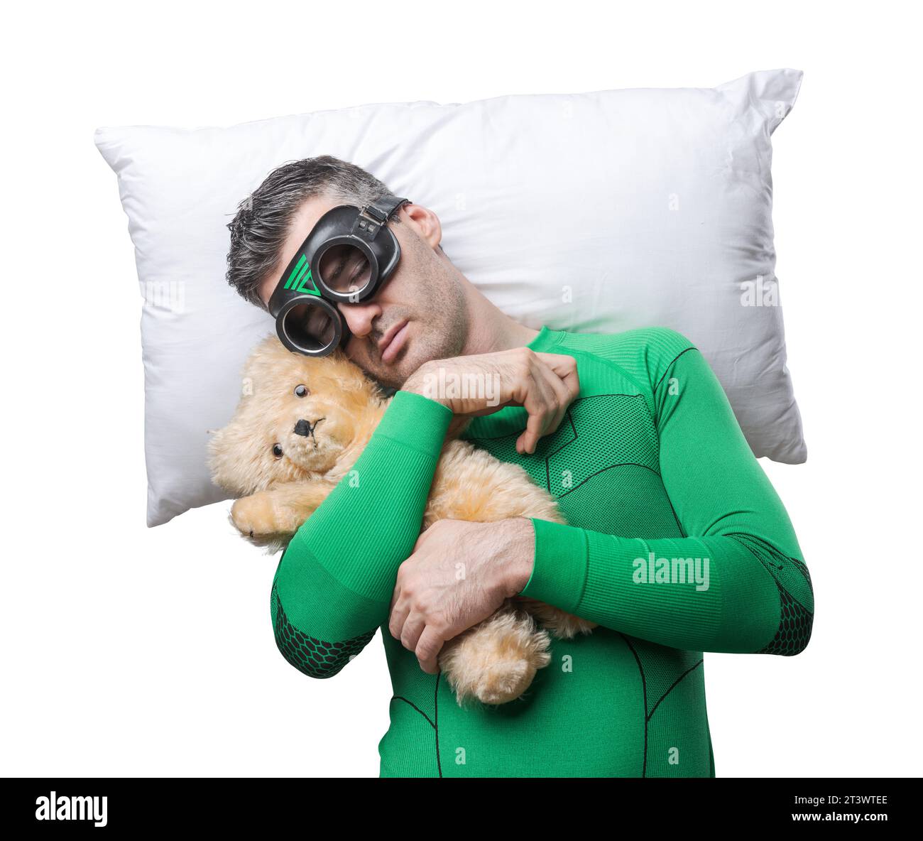 Superhero sleeping on pillow floating in the air with teddy bear Stock ...