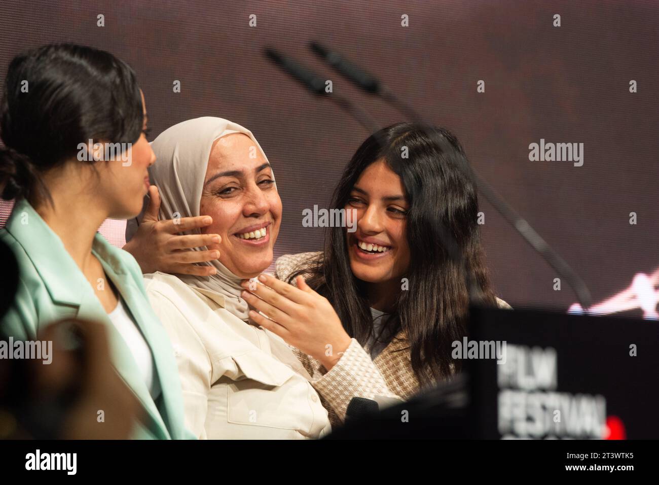 Cologne, Germany. 26th Oct, 2023. Kaouther Ben Hania, Eya Chikhaoui, and Olfa Hamrouni are ...