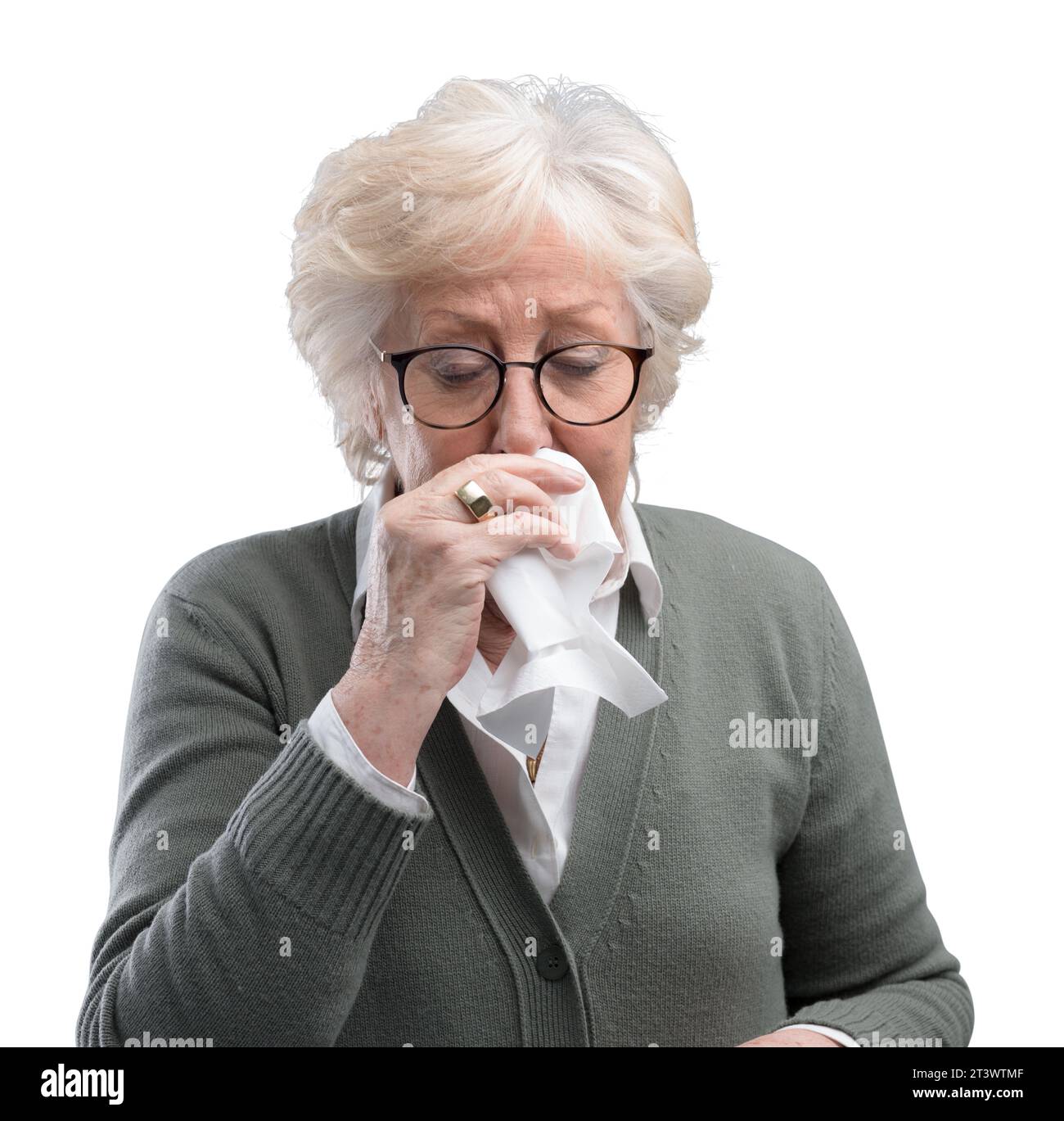Sick senior lady blowing her nose, she has cold and flu Stock Photo - Alamy