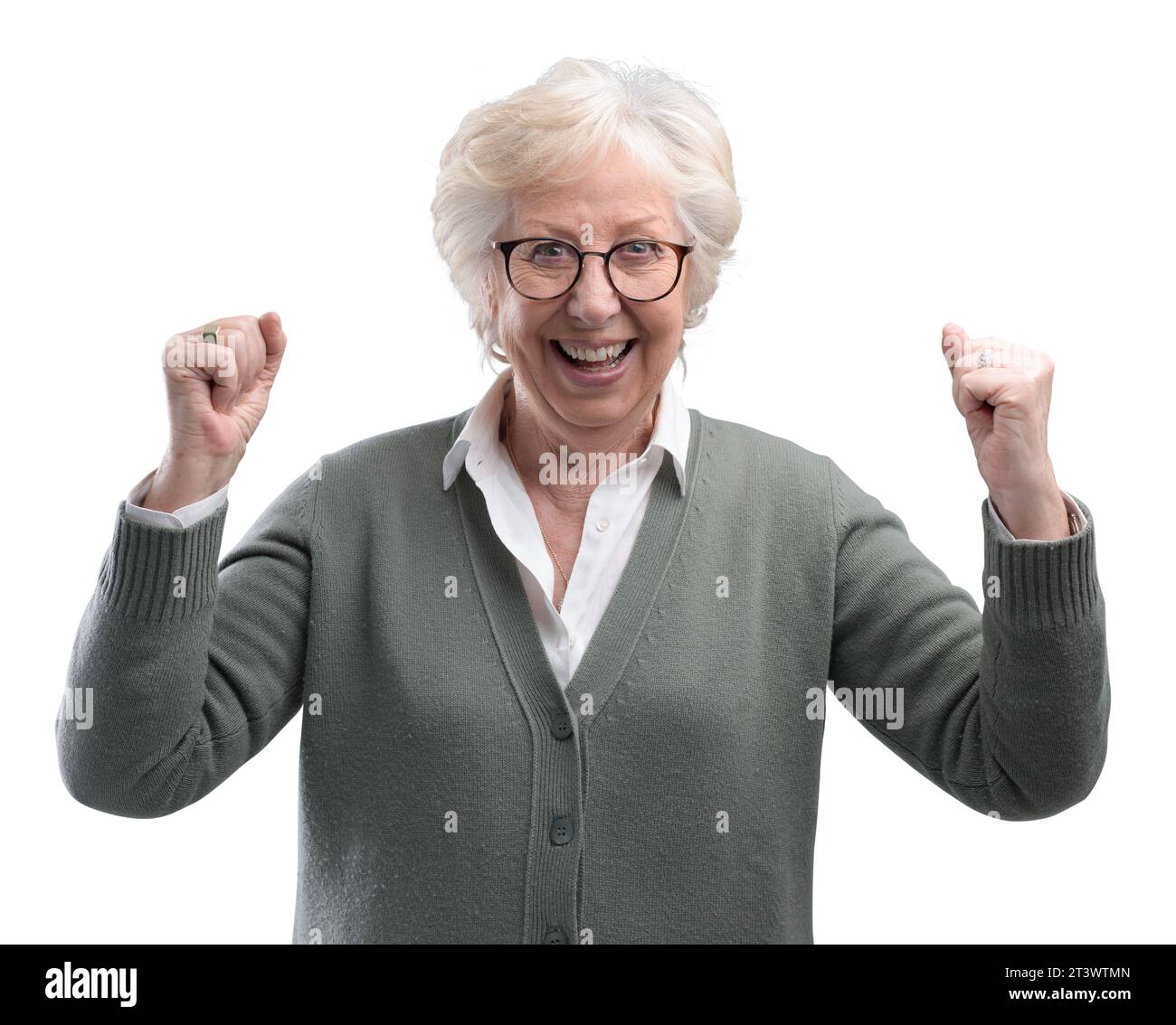 Successful senior lady celebrating her victory with raised fists, she ...