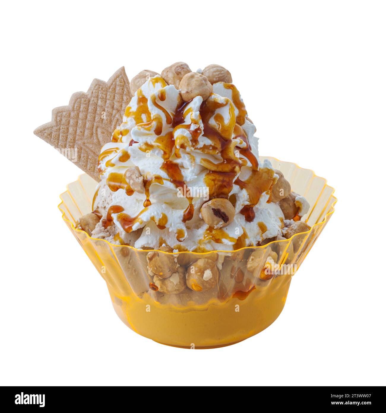Delicious hazelnut ice cream sundae with wafer and toppings in a ...