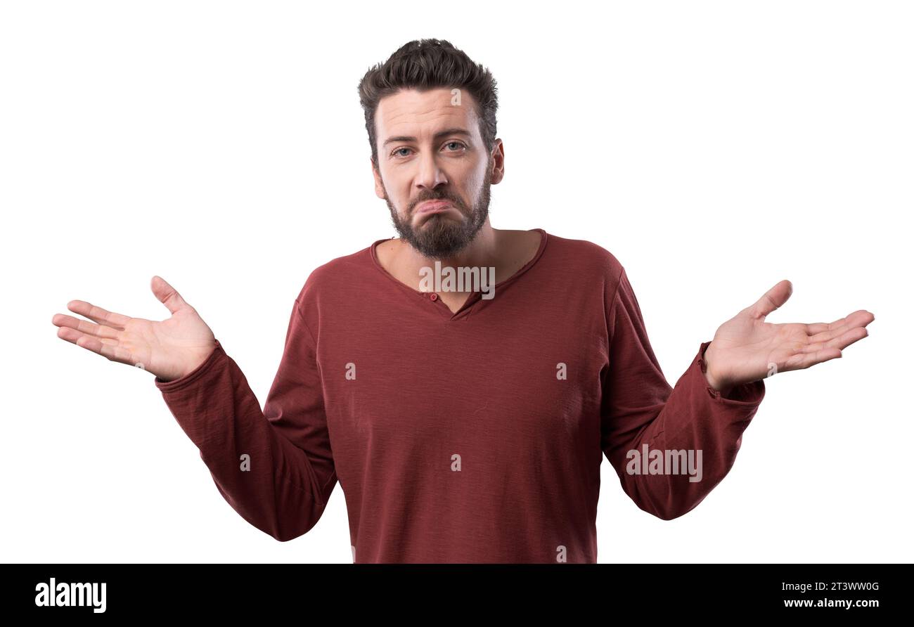Young confused man shrugging and looking at camera Stock Photo - Alamy