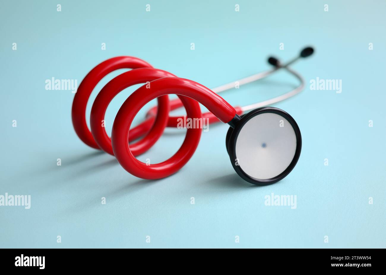 Red doctor stethoscope on blue modern background Stock Photo - Alamy