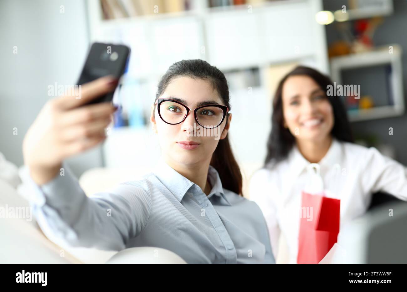 Cute woman on meeting Stock Photo - Alamy