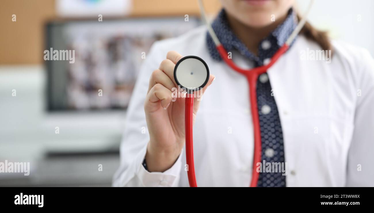 Cardiologist woman examine heart Stock Photo - Alamy