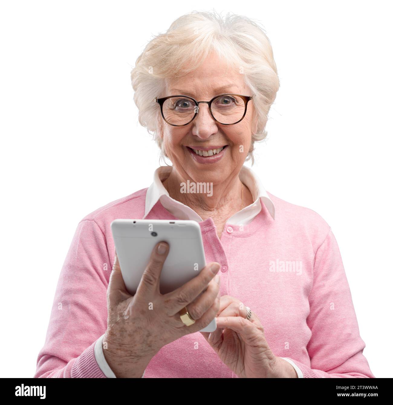 Happy senior lady using a digital touch screen tablet, she is ...