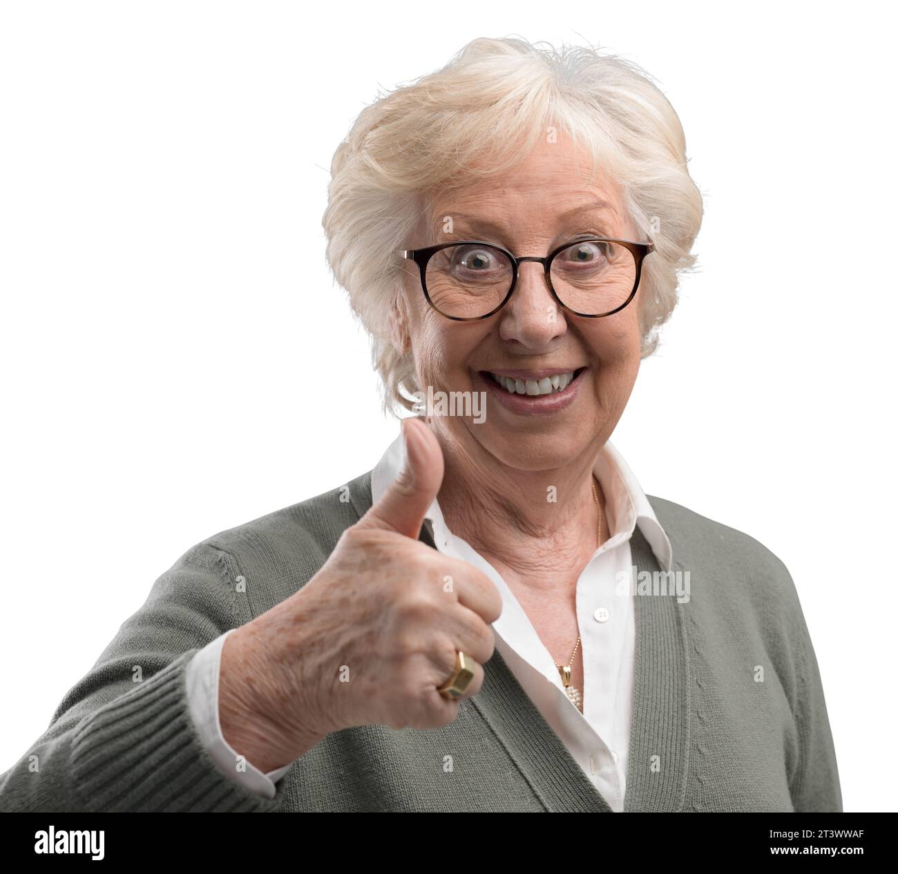 Cheerful senior lady giving a thumbs up and smiling at camera, approval ...