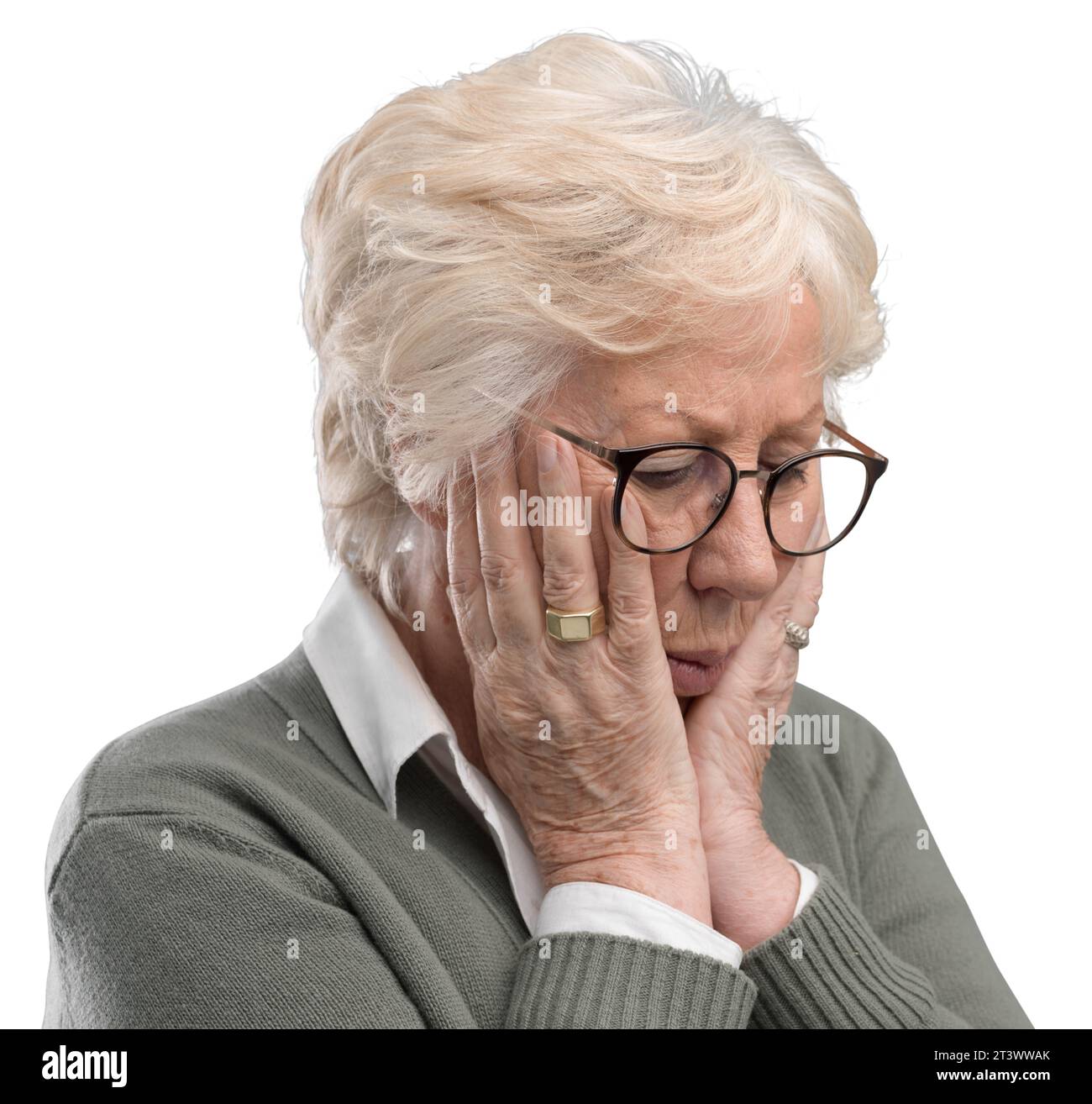 Sad depressed old woman posing with head in hands, she is concerned and ...