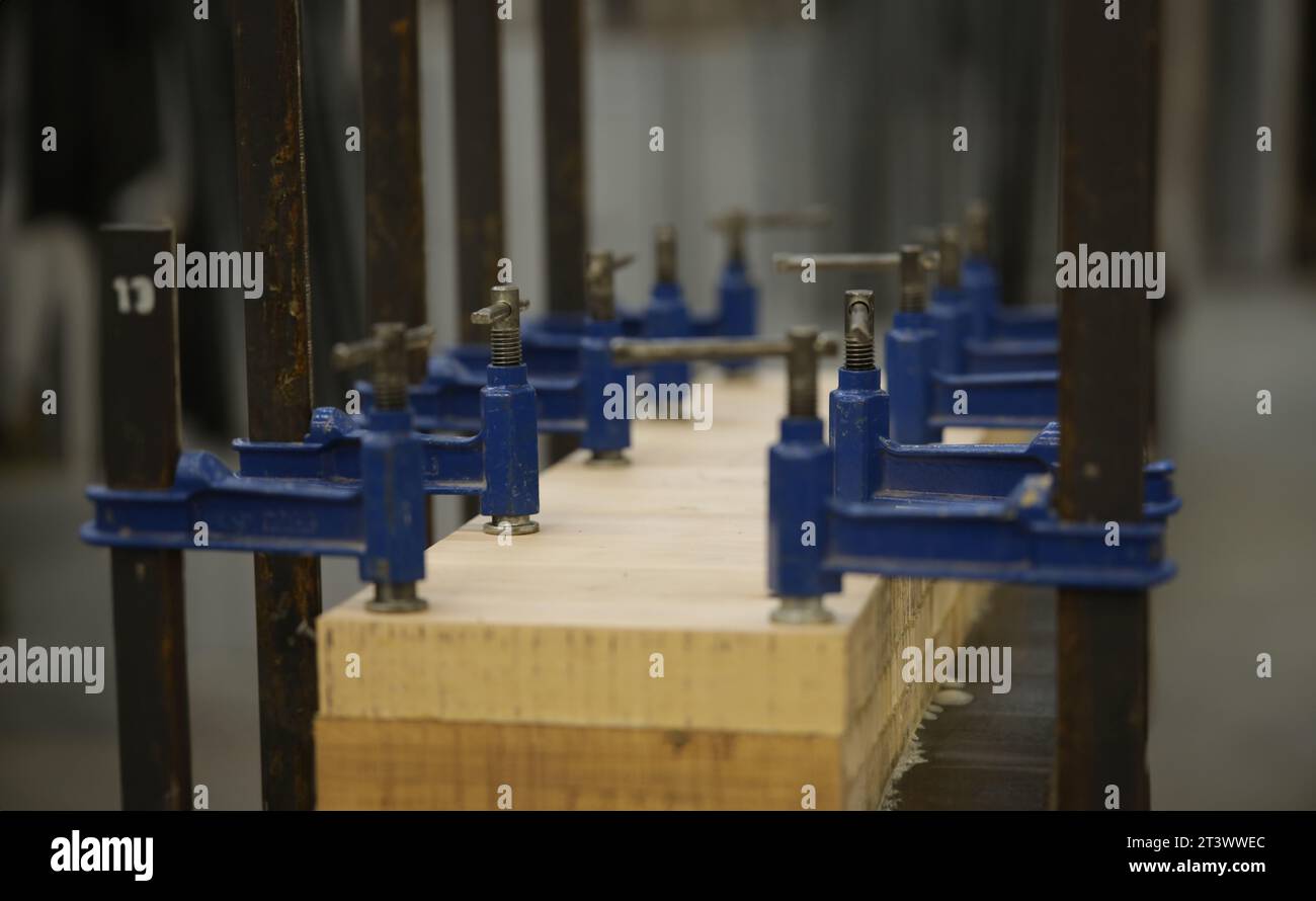 Blue metallic clamps Stock Photo - Alamy