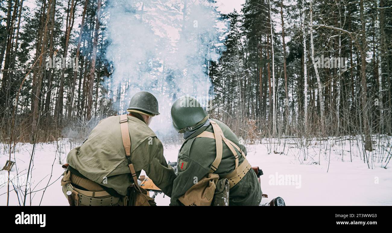 Back View On Re-enactors Dressed As American Infantry Soldiers Fire ...