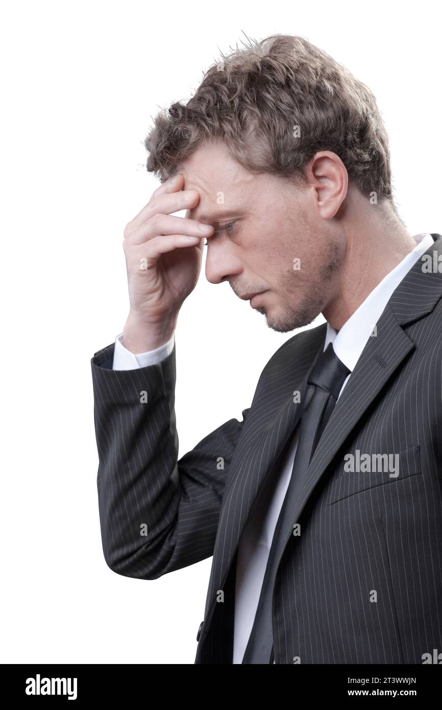 Stressed overworked businessman having a bad headache, he is touching ...
