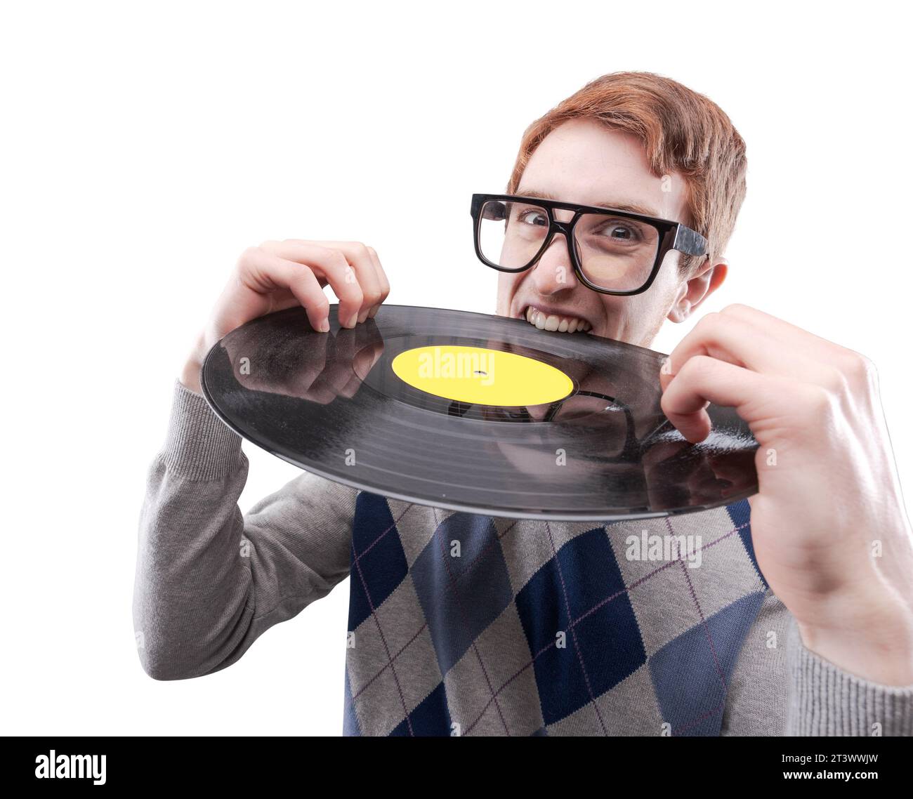 Funny nerd guy with big glasses, he is holding a vinyl record and ...