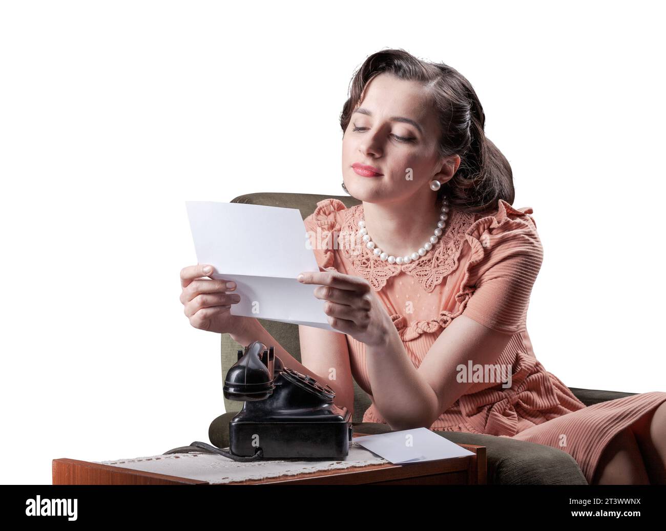 Woman reading letter 1950s hi-res stock photography and images - Alamy