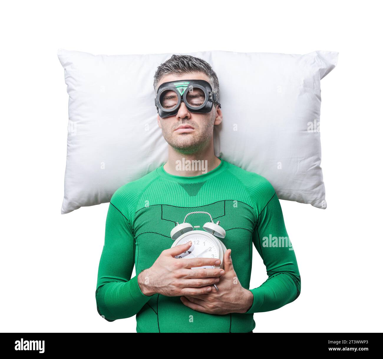 Superhero sleeping on a pillow floating in the air holding alarm clock ...