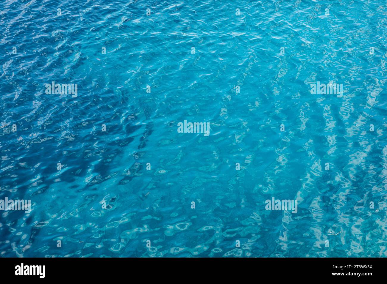 Blue sea surface with transparent shallow water Stock Photo - Alamy