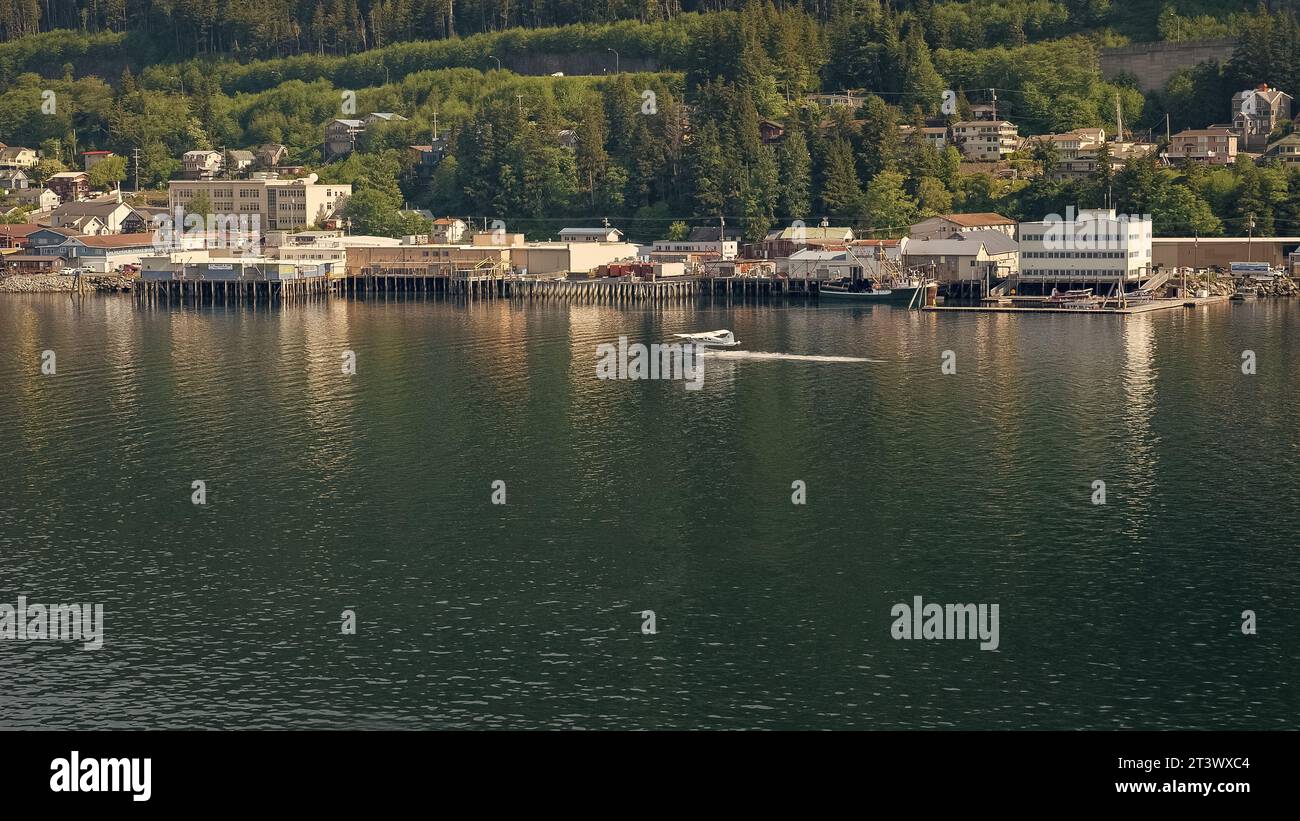 landscape with biplane at seaside alaska city. landscape with biplane ...