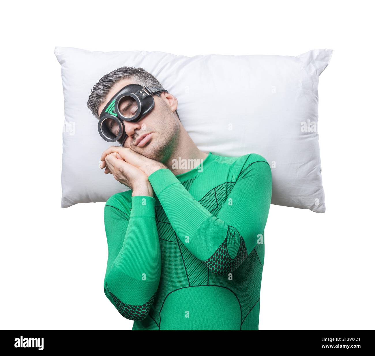 Superhero sleeping on a pillow floating in the air with hands clasped ...
