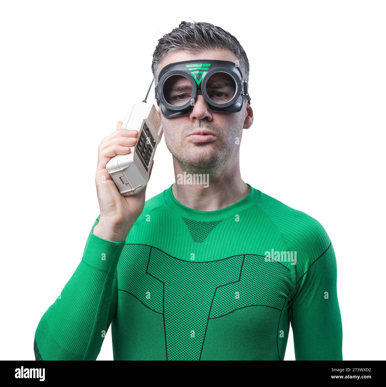 Funny superhero in green costume talking on cordless phone Stock Photo ...