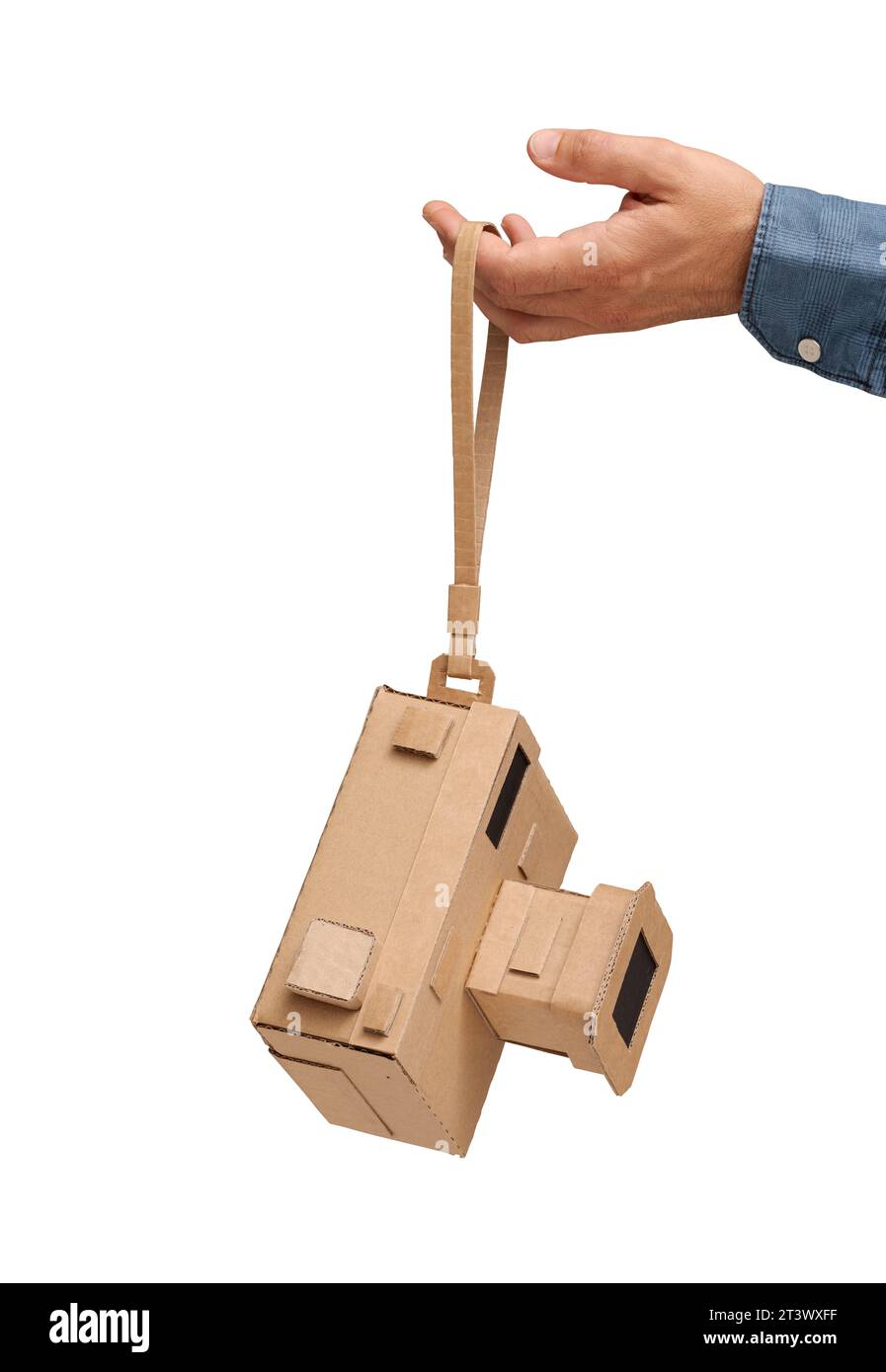 Photographer holding an handmade eco-friendly cardboard camera, crafts ...