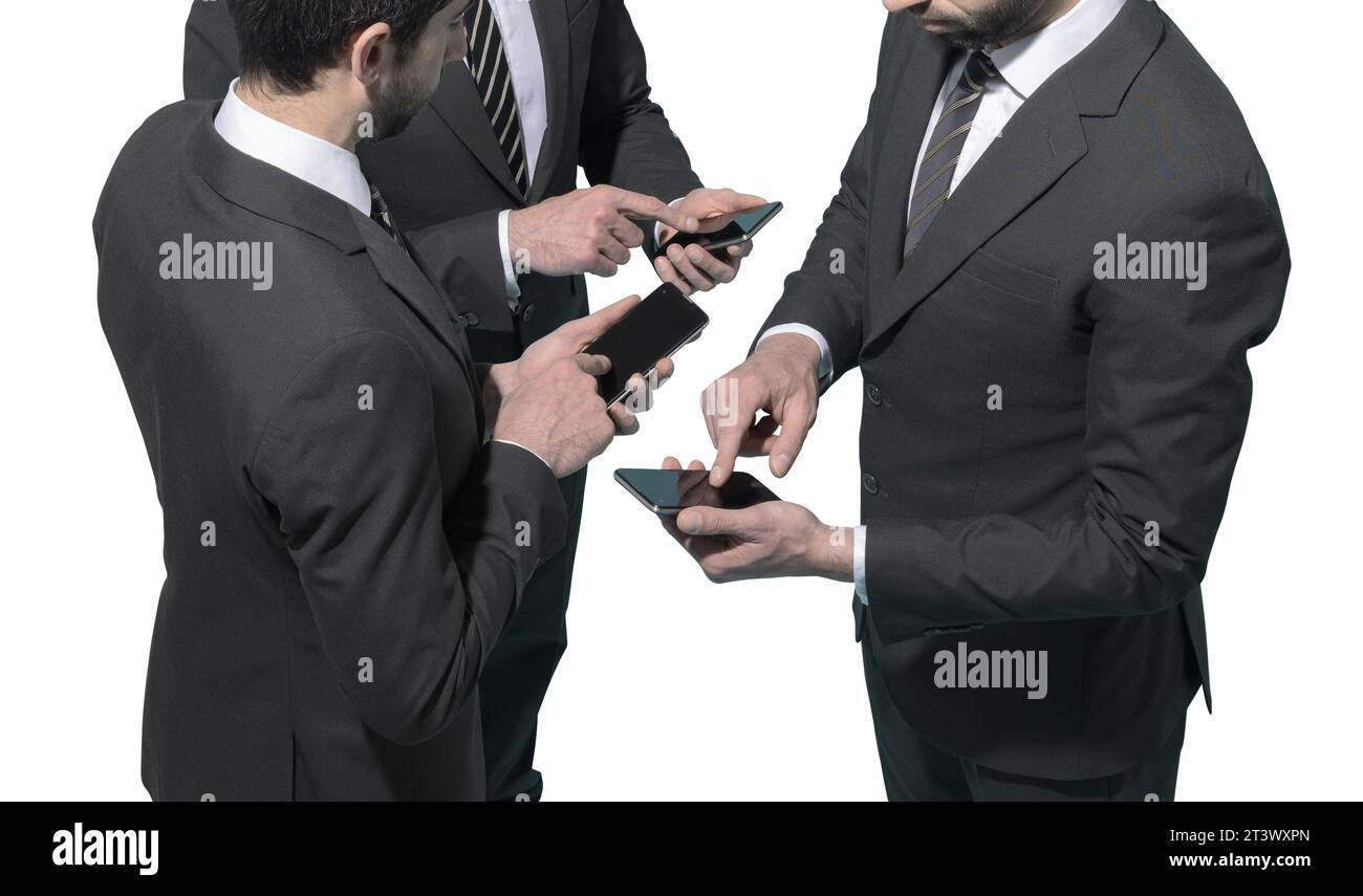 Corporate business people meeting and using their smartphones ...