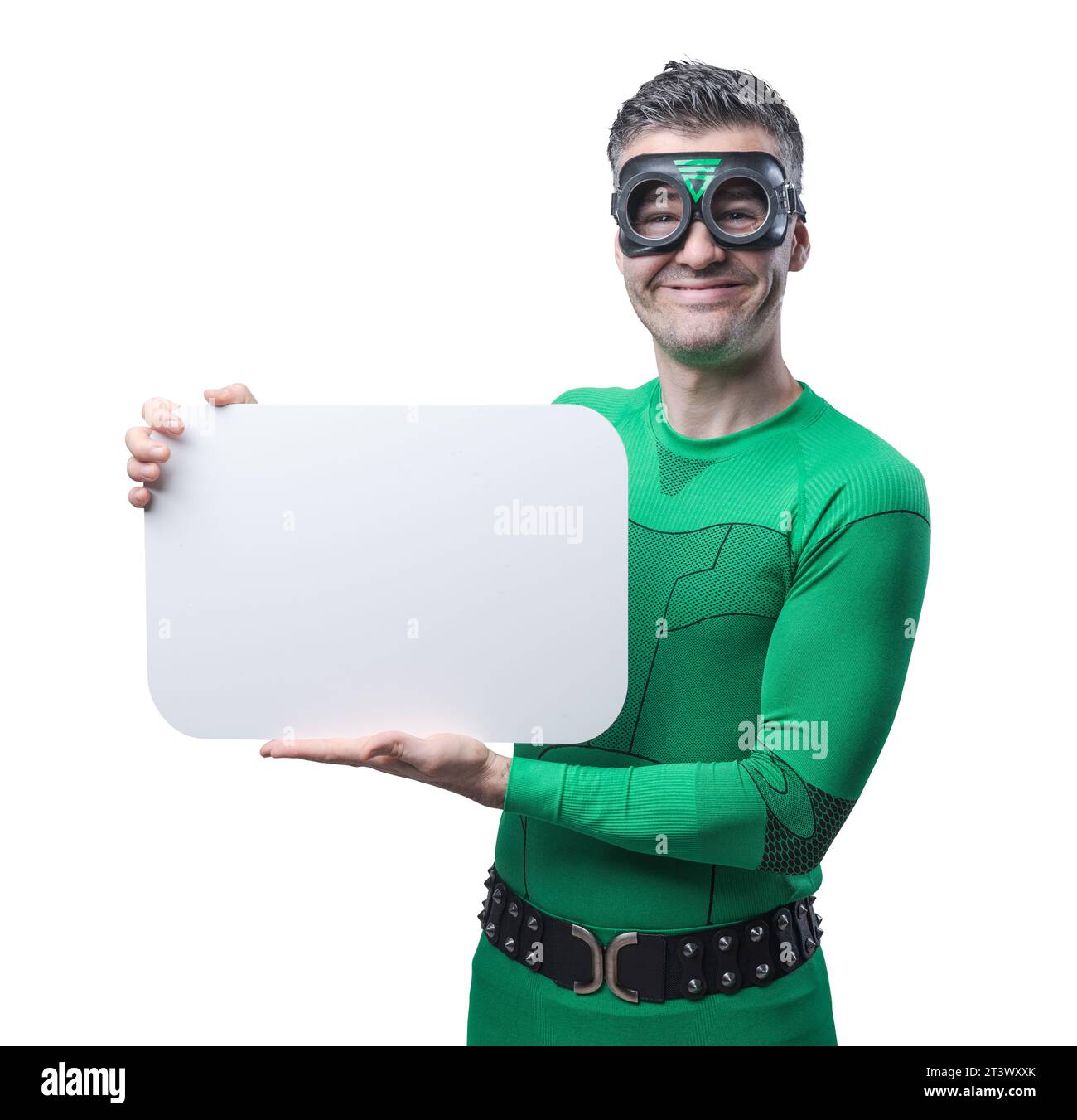 Funny green superhero holding an empty sign and looking at camera Stock ...