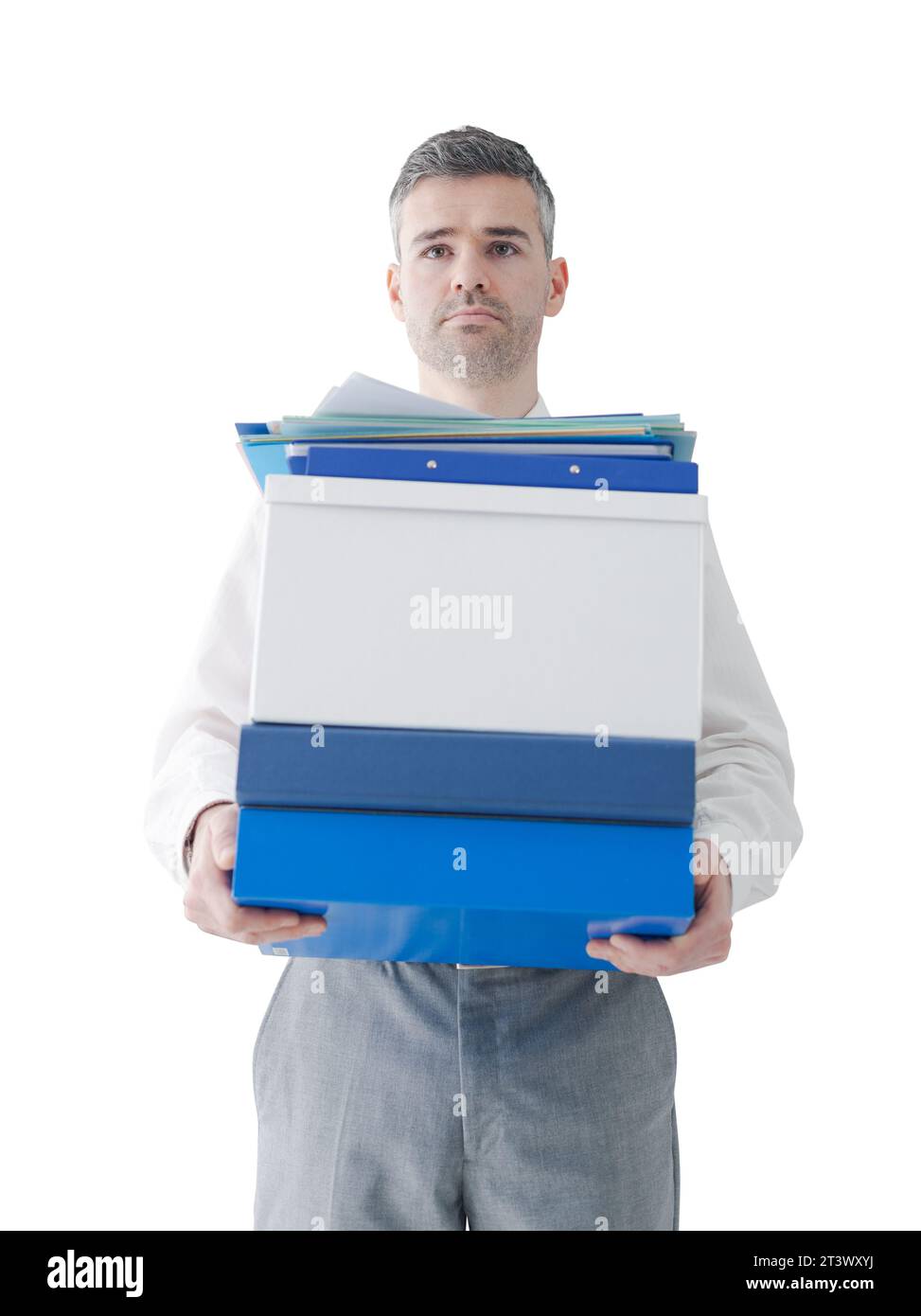 Confident businessman carrying boxes and paperwork in the office Stock ...