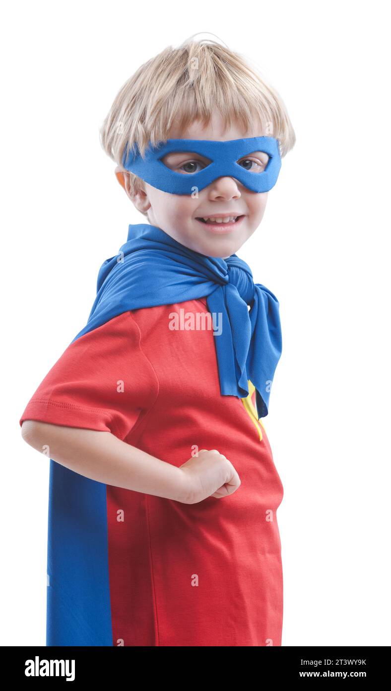 Little Boy in a superhero costume posing isolated on white background ...