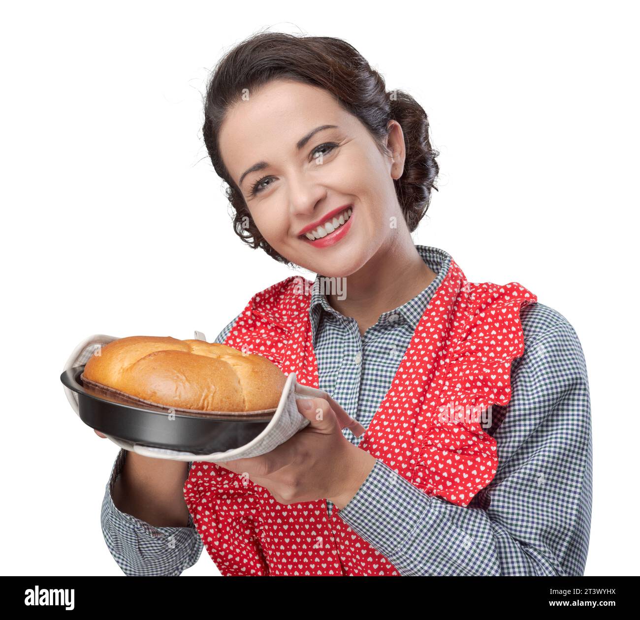 Smiling vintage woman holding an homemade cake in a baking tin Stock ...