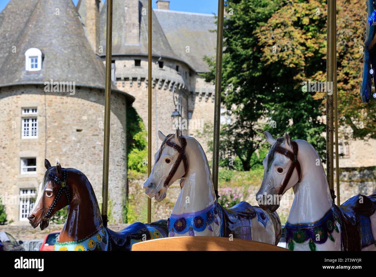 Wooden horses from the carousel in front of the Château de Pompadour ...