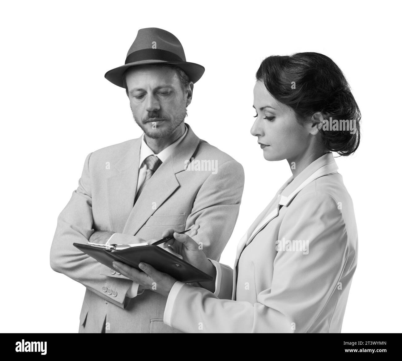 Vintage manager and secretary working together checking notes and ...