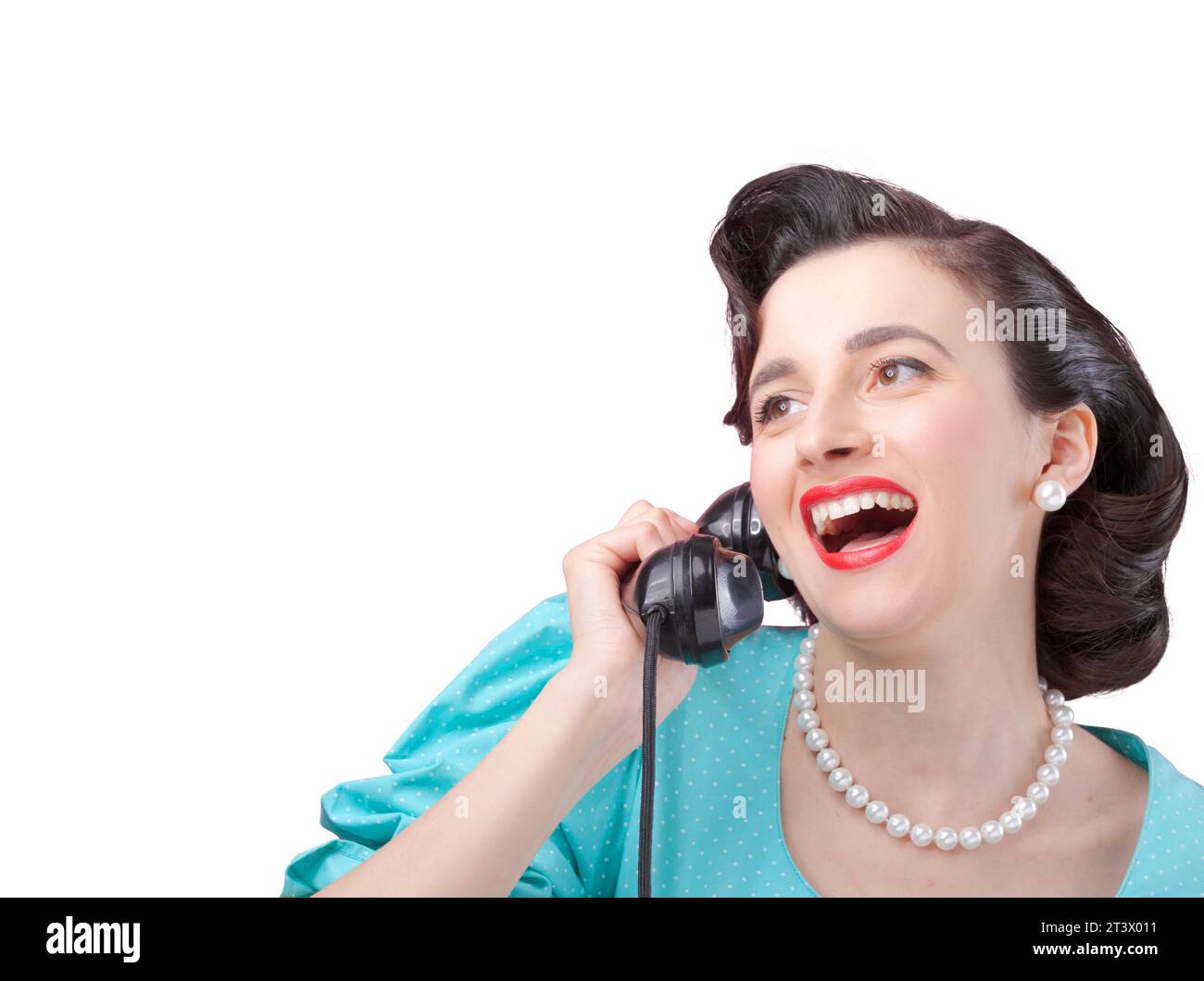 Cheerful vintage style elegant woman having an exciting phone call and ...