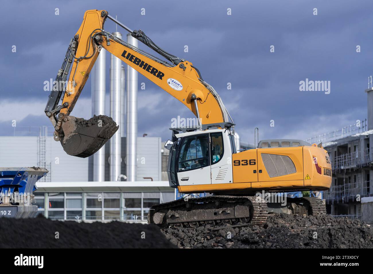Yellow crawler excavator Liebherr R 936 on construction site Stock ...