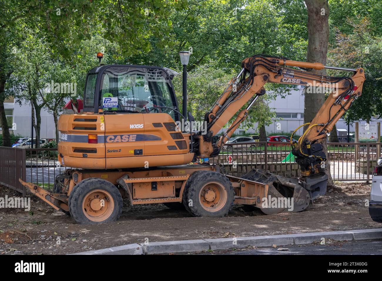 Le Havre, France - Orange wheeled excavator CASE WX95 Series 2 on ...