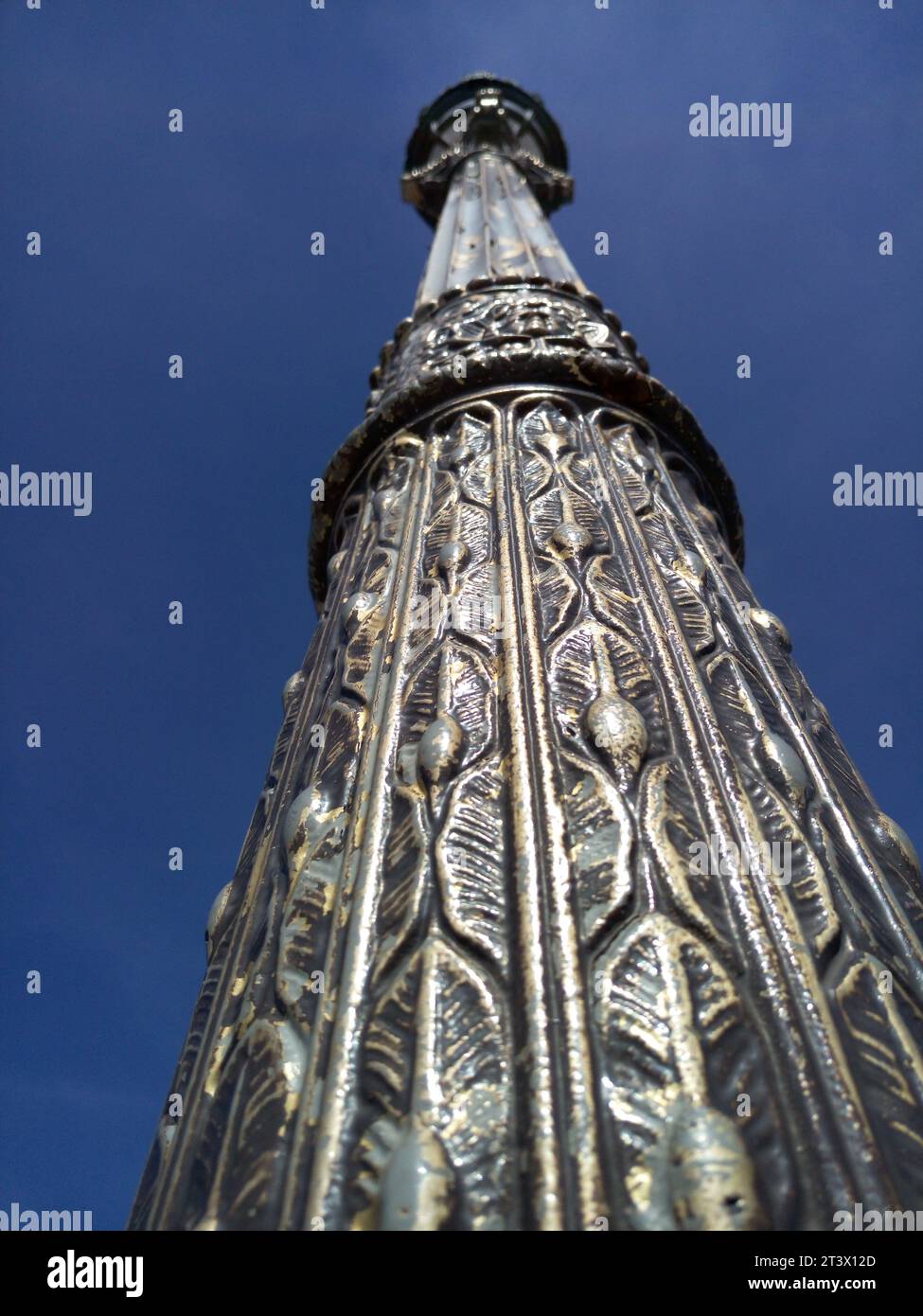 Bronze column in Paris, France. High column with old ornament Stock ...