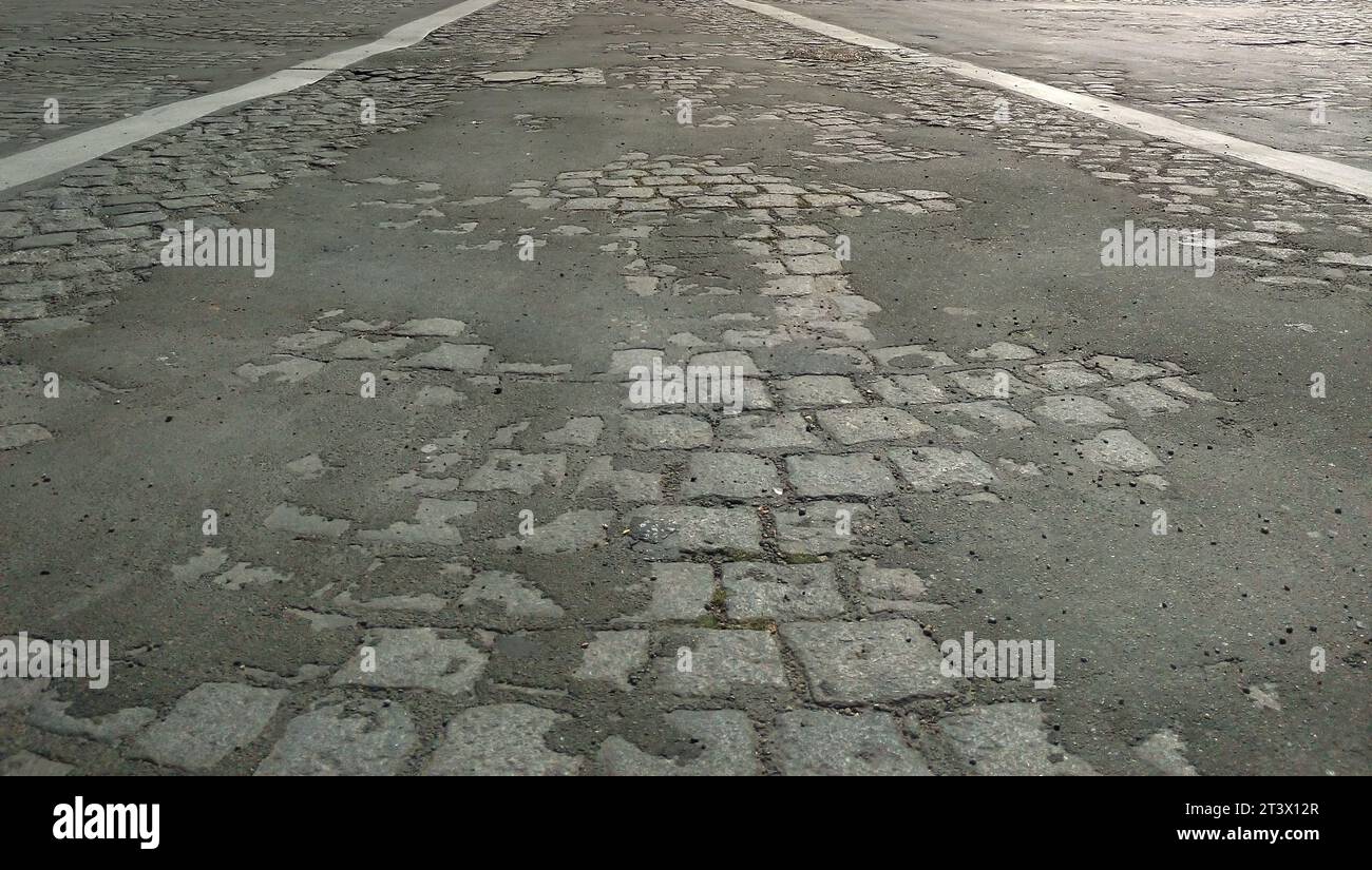 Streets road pavement in Paris, France. Stones and asphalt Stock Photo ...