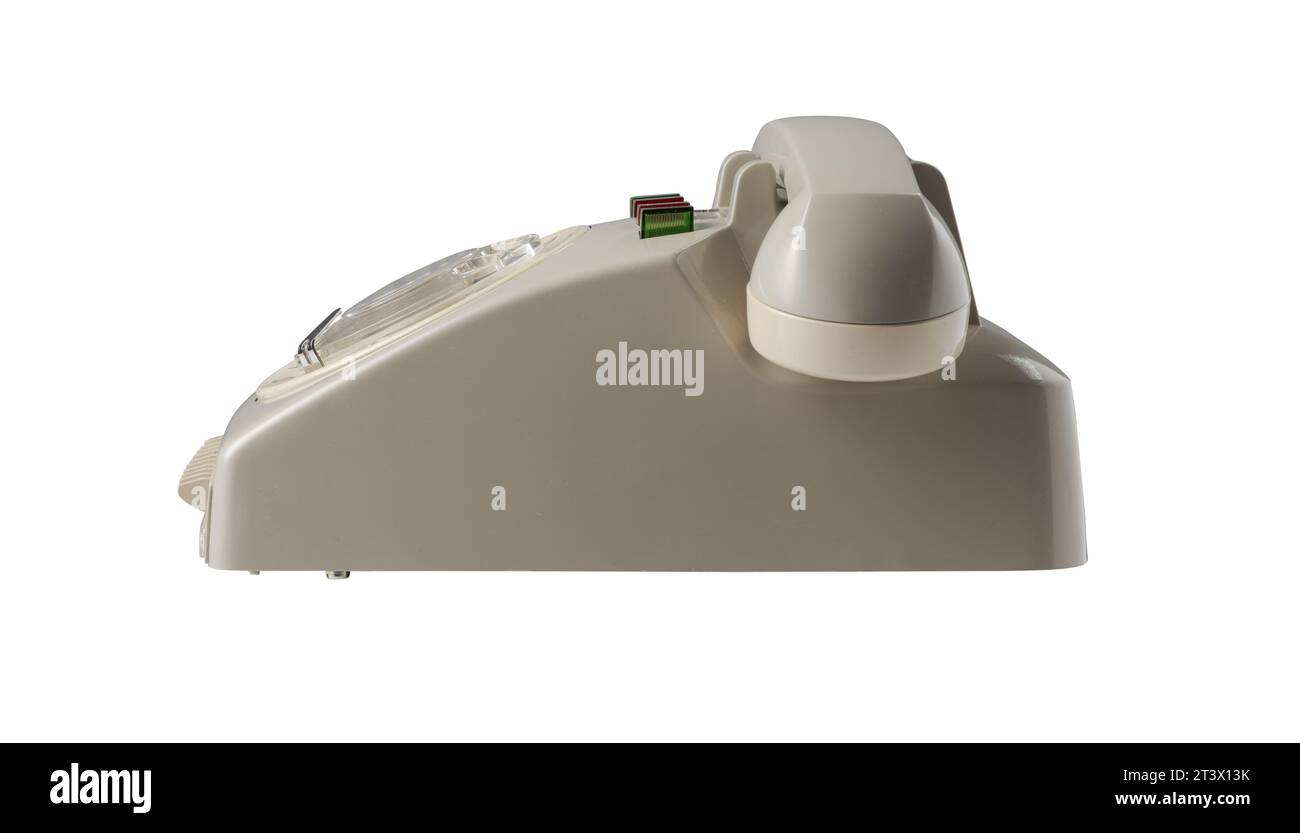 Vintage beige phone isolated on white background Stock Photo - Alamy