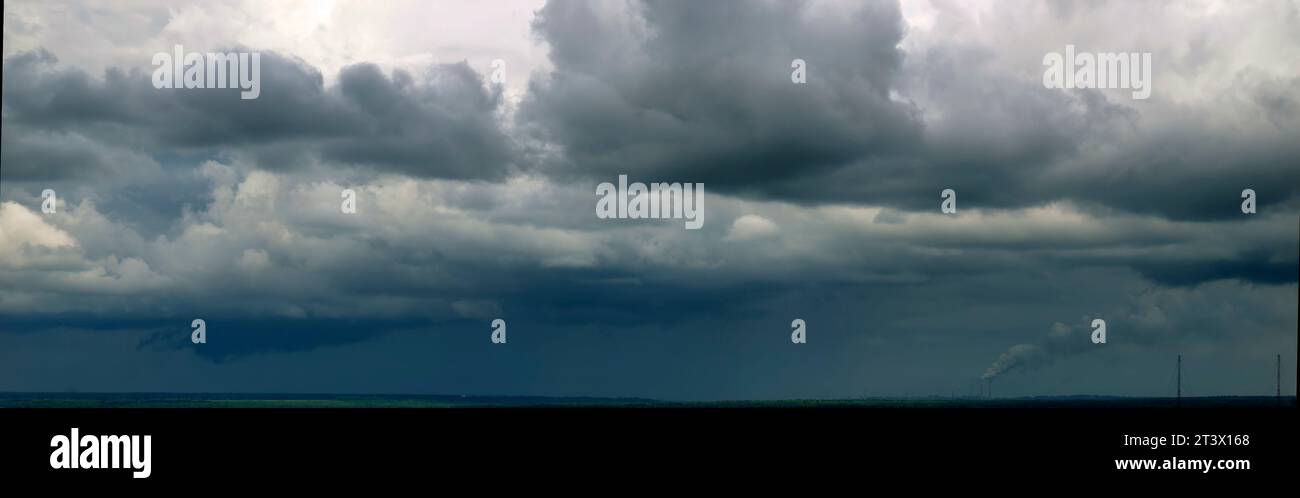 Air pollution photo: heavy clouds mixed with smoke from industrial ...