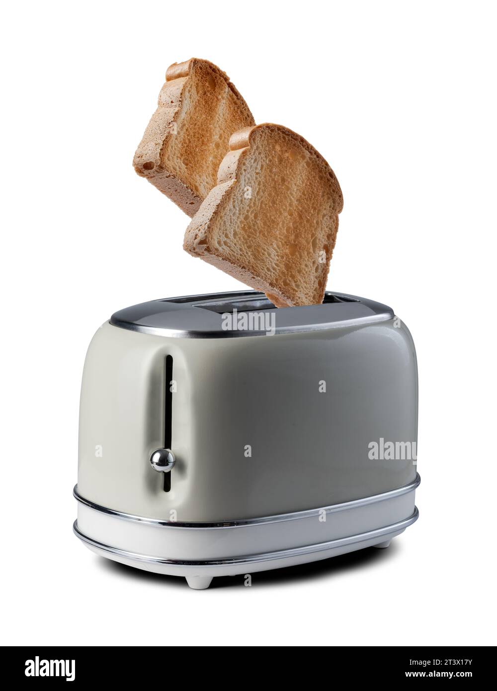 Roasted toast bread popping up of vintage toaster on a white backgroun ...