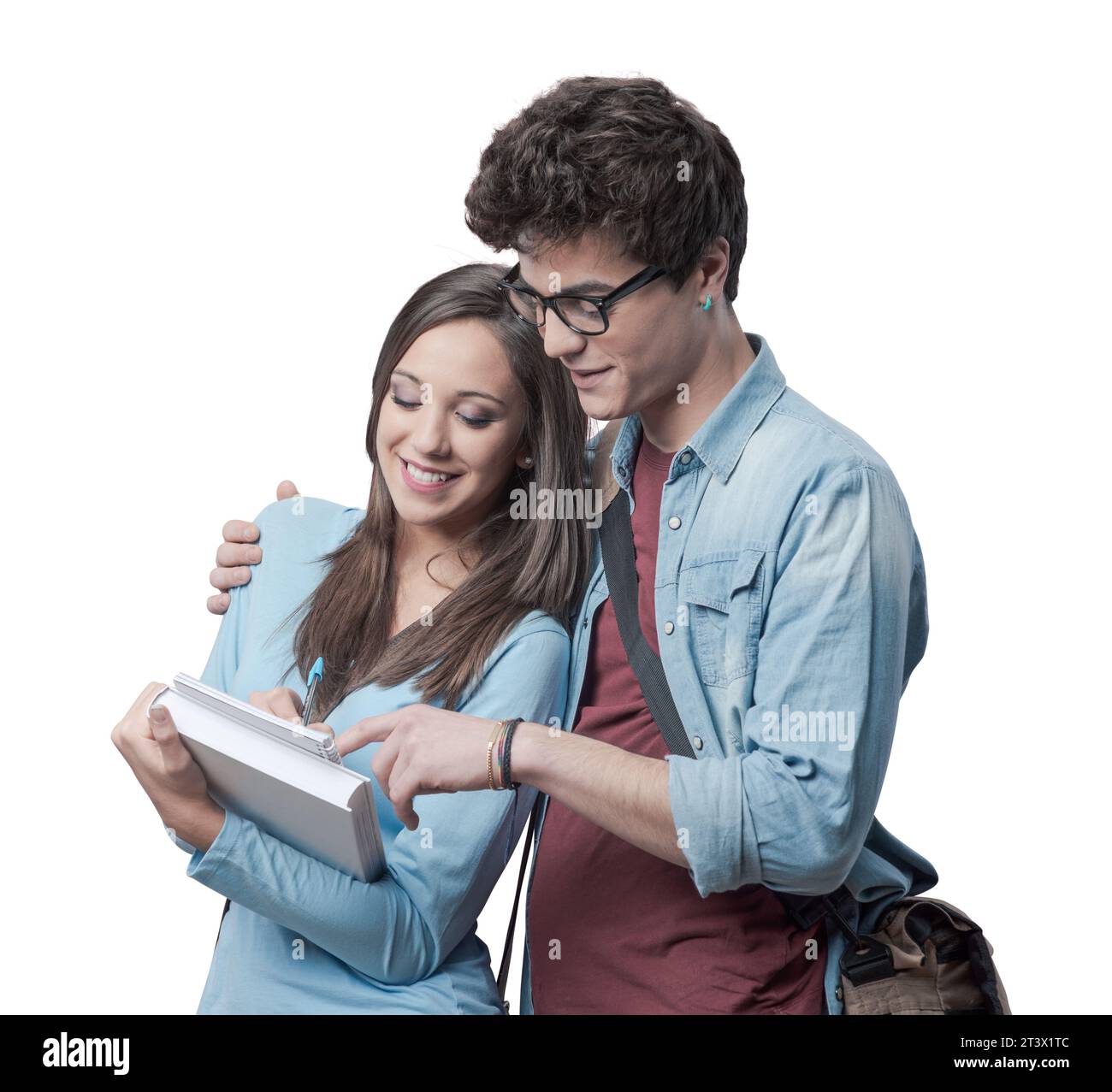 Cheerful smiling students with textbooks hanging out together Stock ...