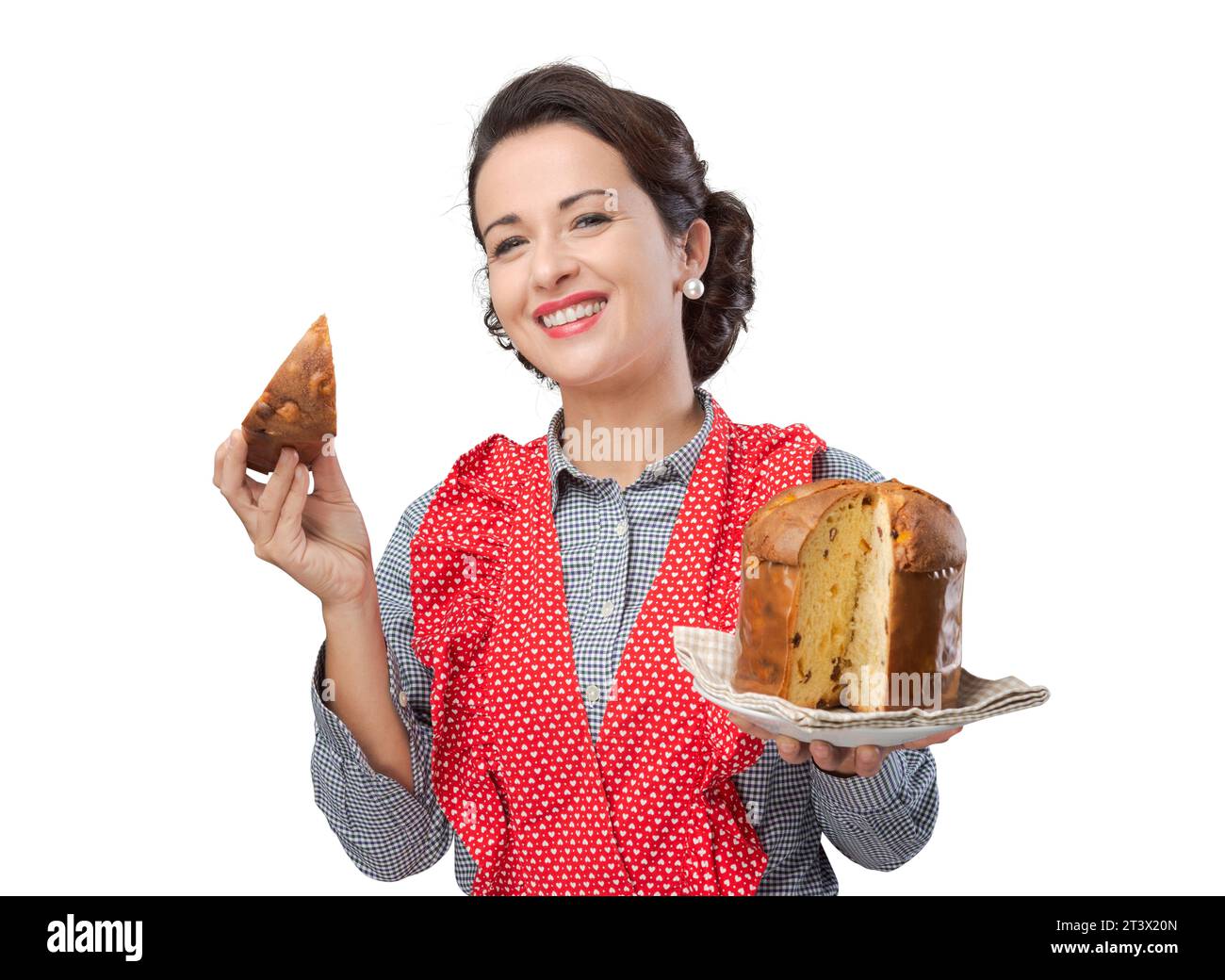 Vintage woman in apron eating a slice of panettone, traditional italian ...