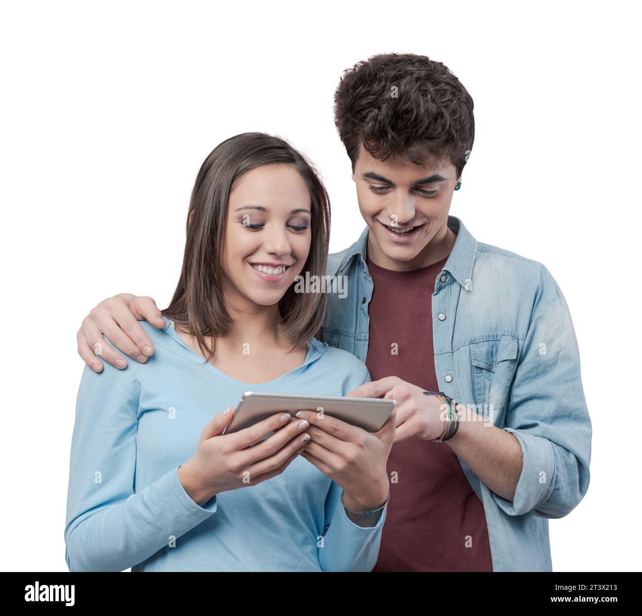 Cheerful teenagers using touch screen hi-res stock photography and ...